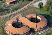 MASS Design Group uses earthen walls for Rwandan university campus